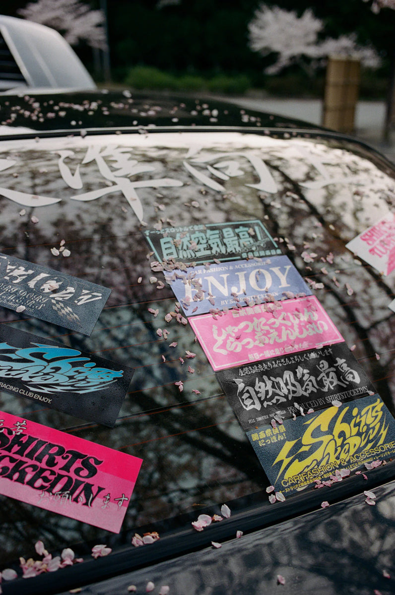 SHIRTSTUCKEDIN NEW LOGO CHECKER RACING CLUB ENJOY STICKER – 86 Fighters